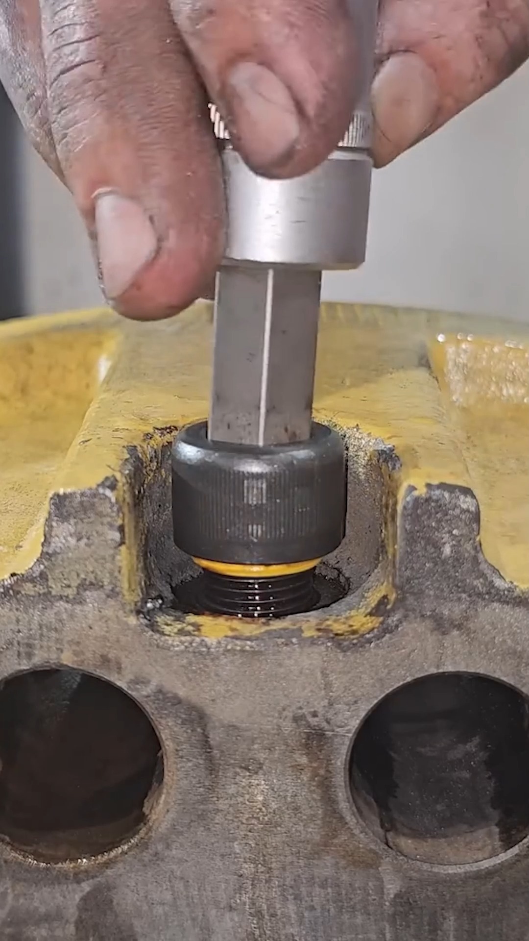 Damaged Thread Repair on a 992G Wheel Loader