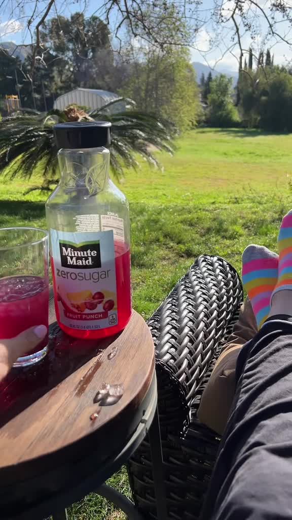 A Relaxing Moment With My Dog and Fruit Punch Outdoors
