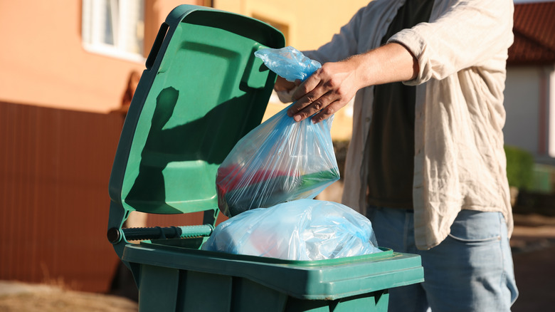 Proud Homeowner Shares Clever DIY Solution To Hide Outdoor Trash Cans ...