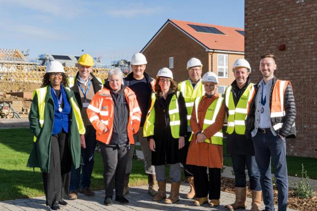 Island housing project highlighted during planning institute visit
