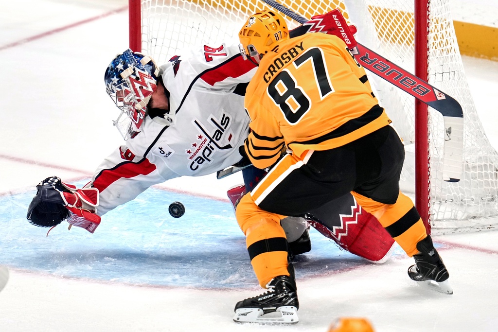 Sidney Crosby scores twice as Pittsburgh holds off Washington and Alex ...