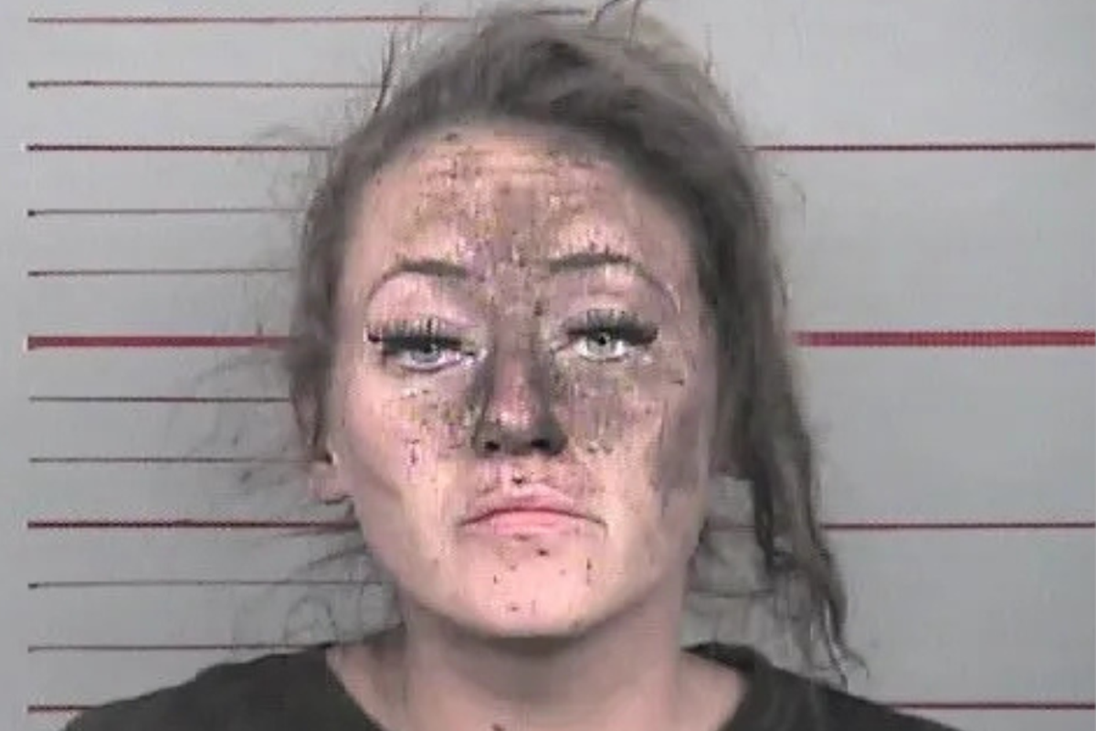 Iowa woman arrested for burglary after being found in business walls