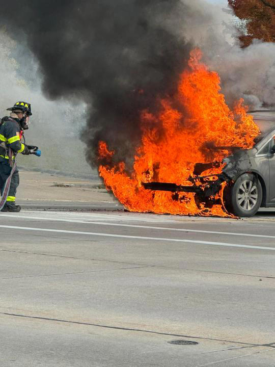 Ohio school van catches fire with people trapped inside