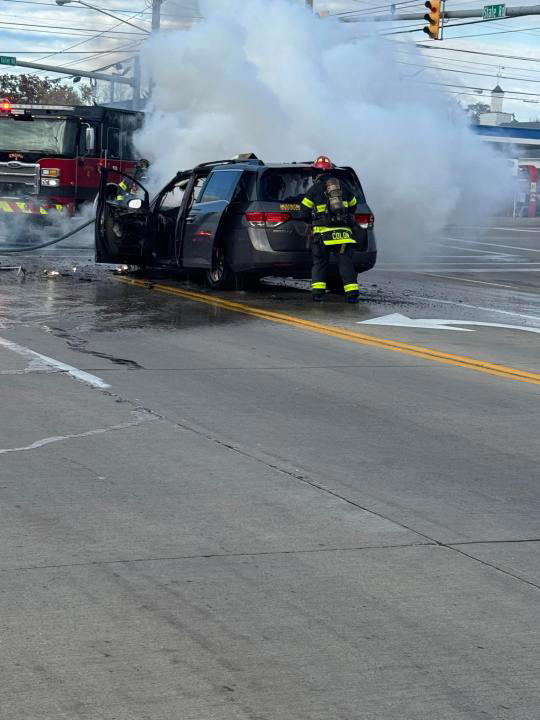 Ohio school van catches fire with people trapped inside