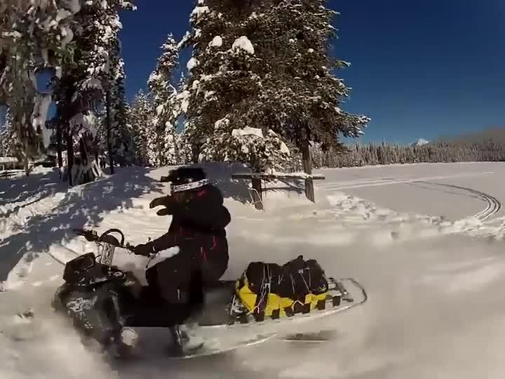 Guy on Snowmobile Crashes Straight into Tree