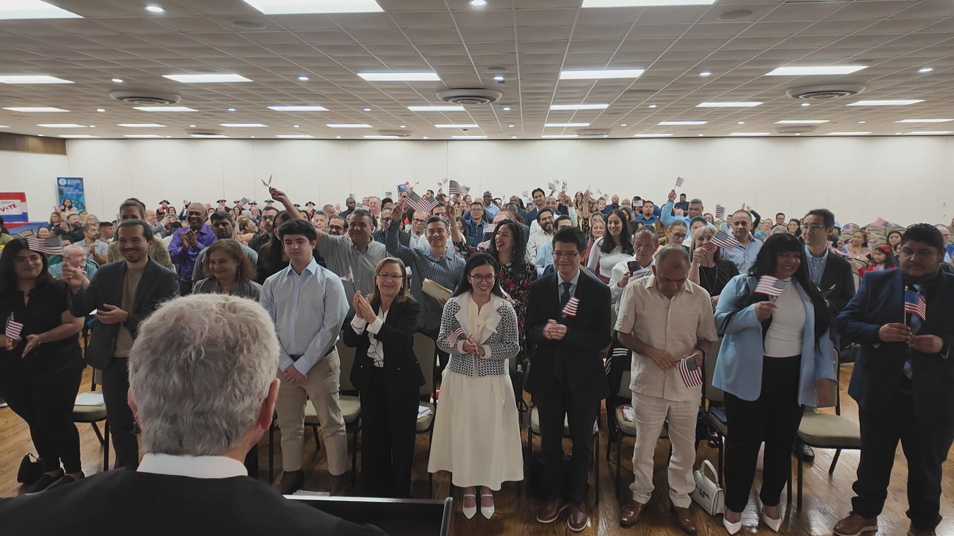 More than 100 new U.S. Citizens take oath during ceremony at Brazos Center