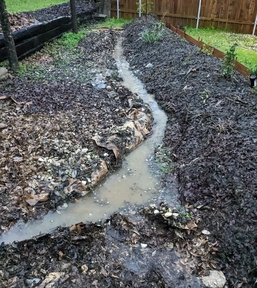 Proud homeowner shares stunning photos of solution to backyard flooding ...