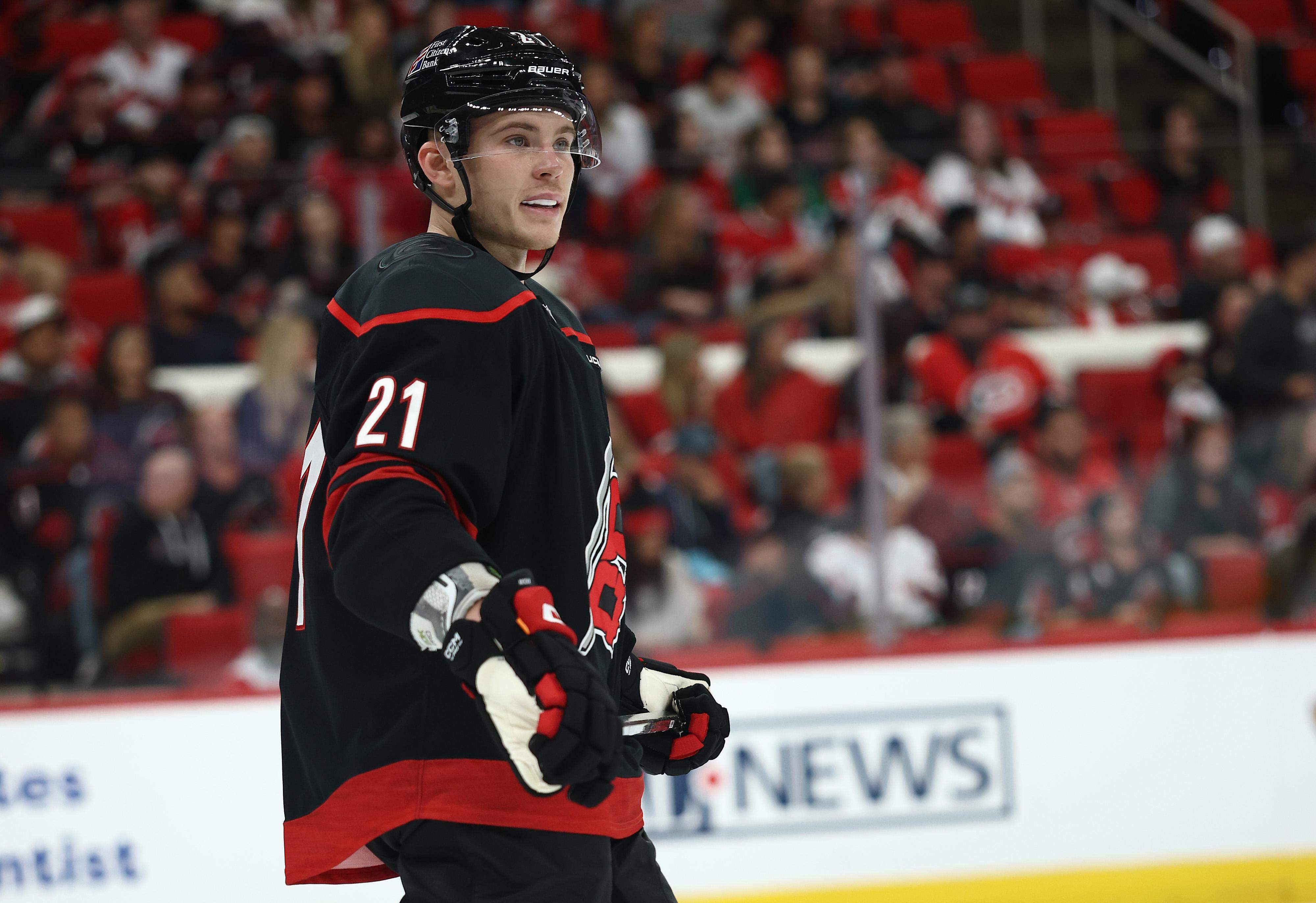 Bruised and battered, Oliver Moore lifts Blackhawks past Hurricanes in ...