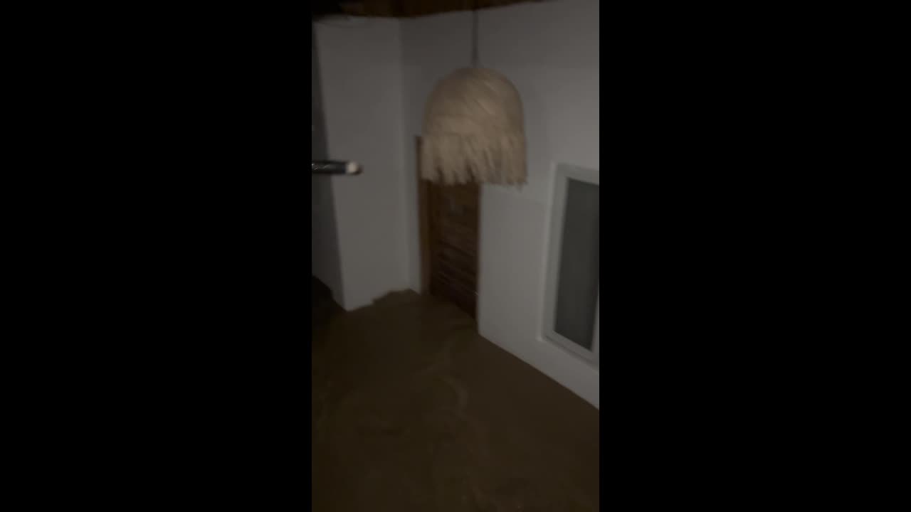 Spanish tourist clings to roof as typhoon floods homes in the Philippines