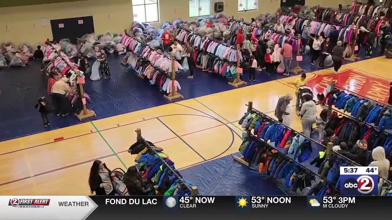 Kids pick their favorite coats to stay warm at Coats for Kids event