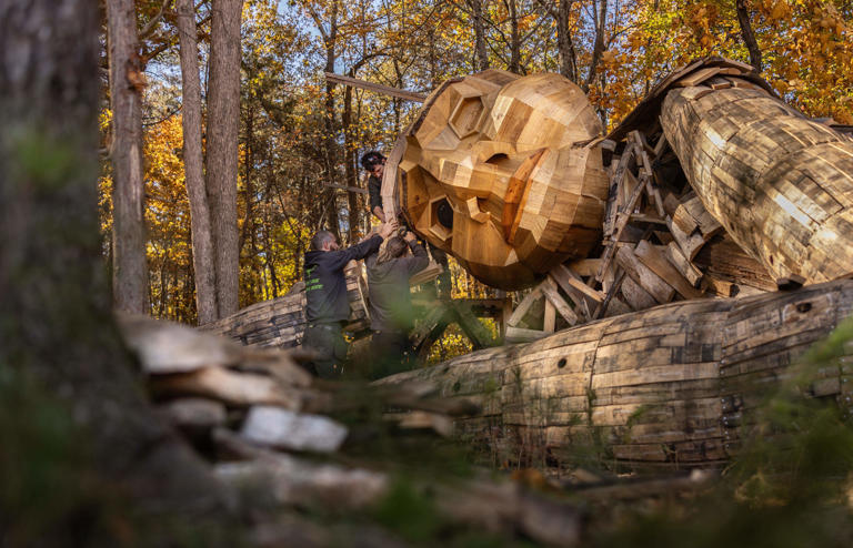 A 65-foot wooden troll arrived in Charlotte to watch over the River ...
