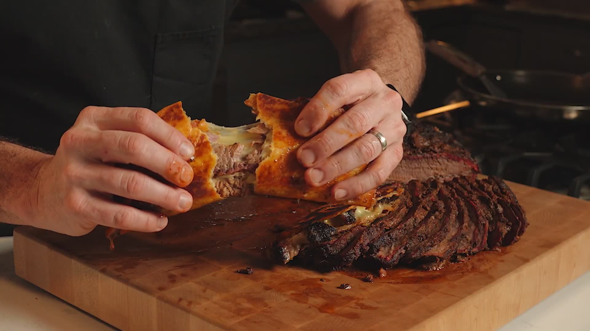 Traeger smoked cheesy brisket birria tacos