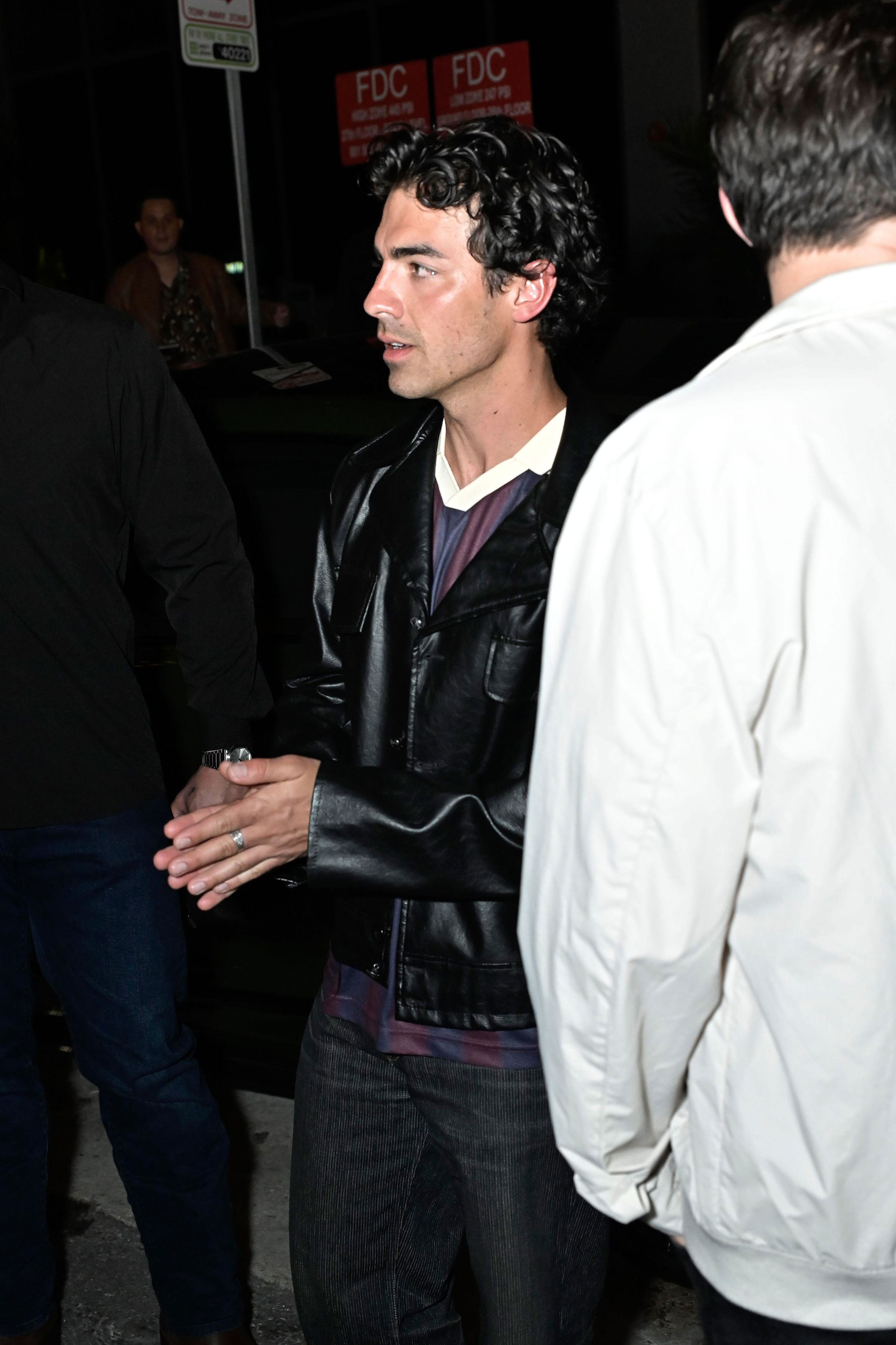 Joe Jonas cozies up to mystery woman at Bad Bunny’s private party in Miami