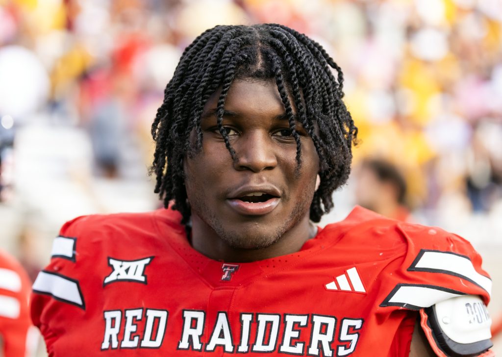 College football player attacked photographer