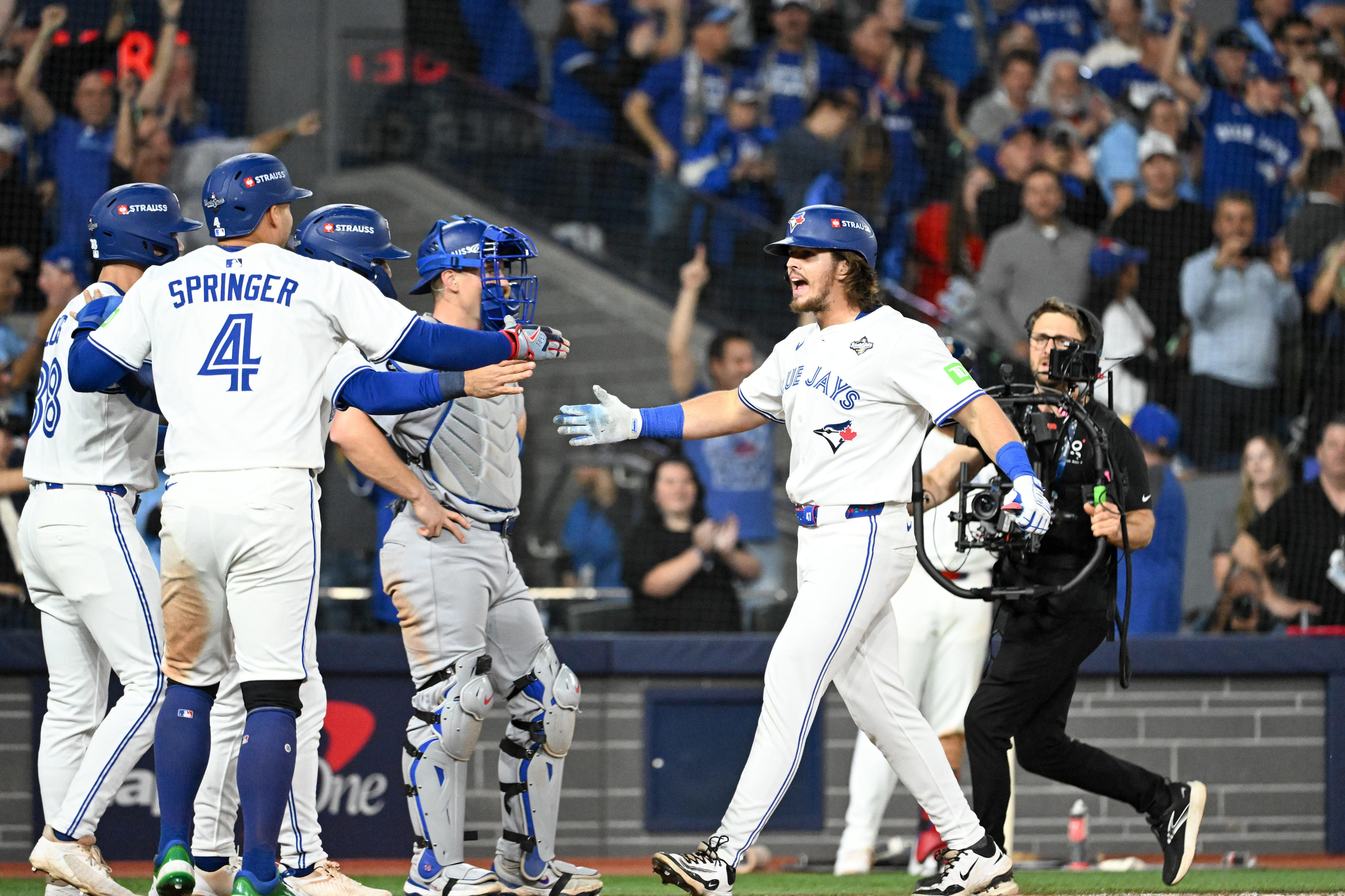 Blue Jays' World Series hero slept on teammate's couch before grand slam