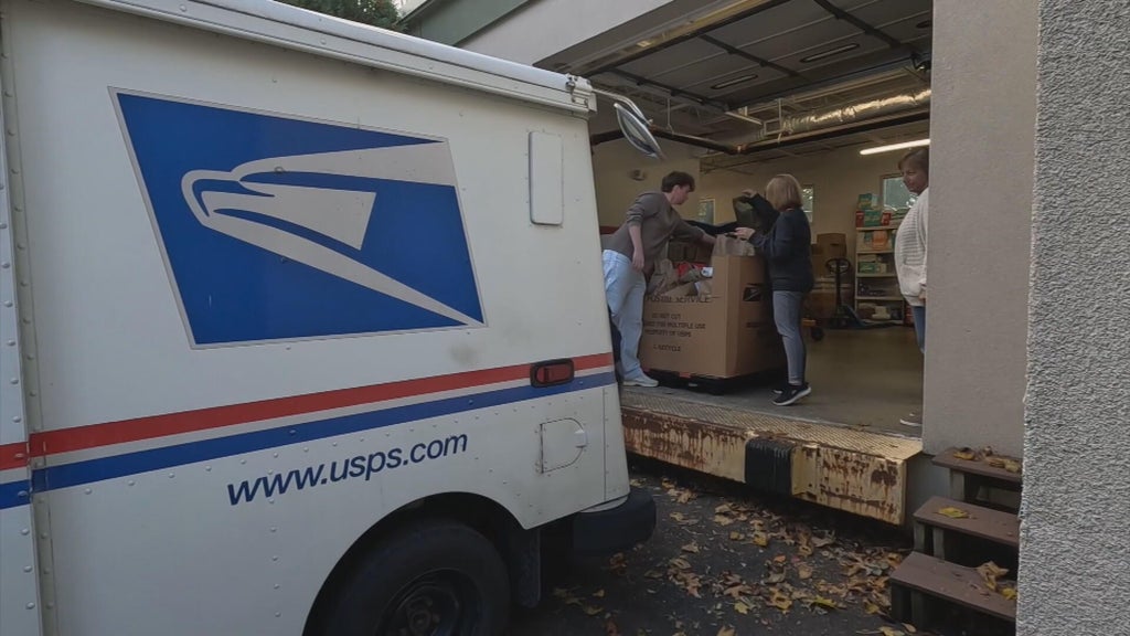 USPS mail carriers in Massachusetts go door to door to collect ...