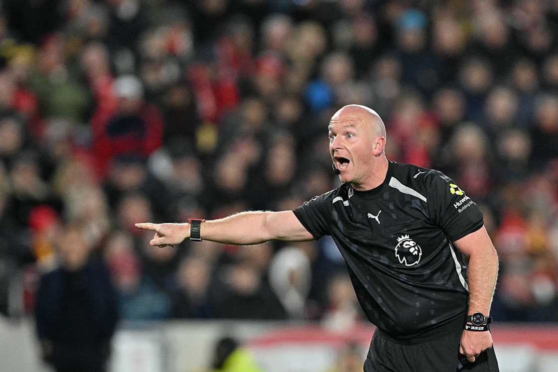 Simon Hooper: Brentford vs Liverpool delayed after referee suffers ...