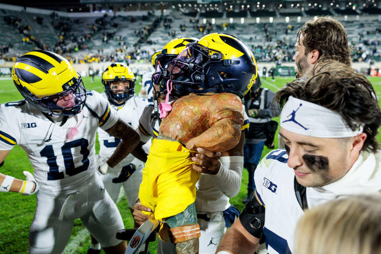 Michigan State bogged down with penalties in unfocused rivalry defeat