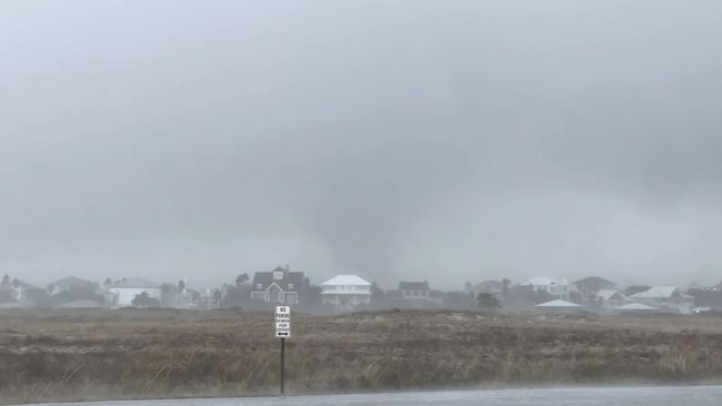 Funnel Forms as Tornado-Warned Storms Lash Alabama Coast