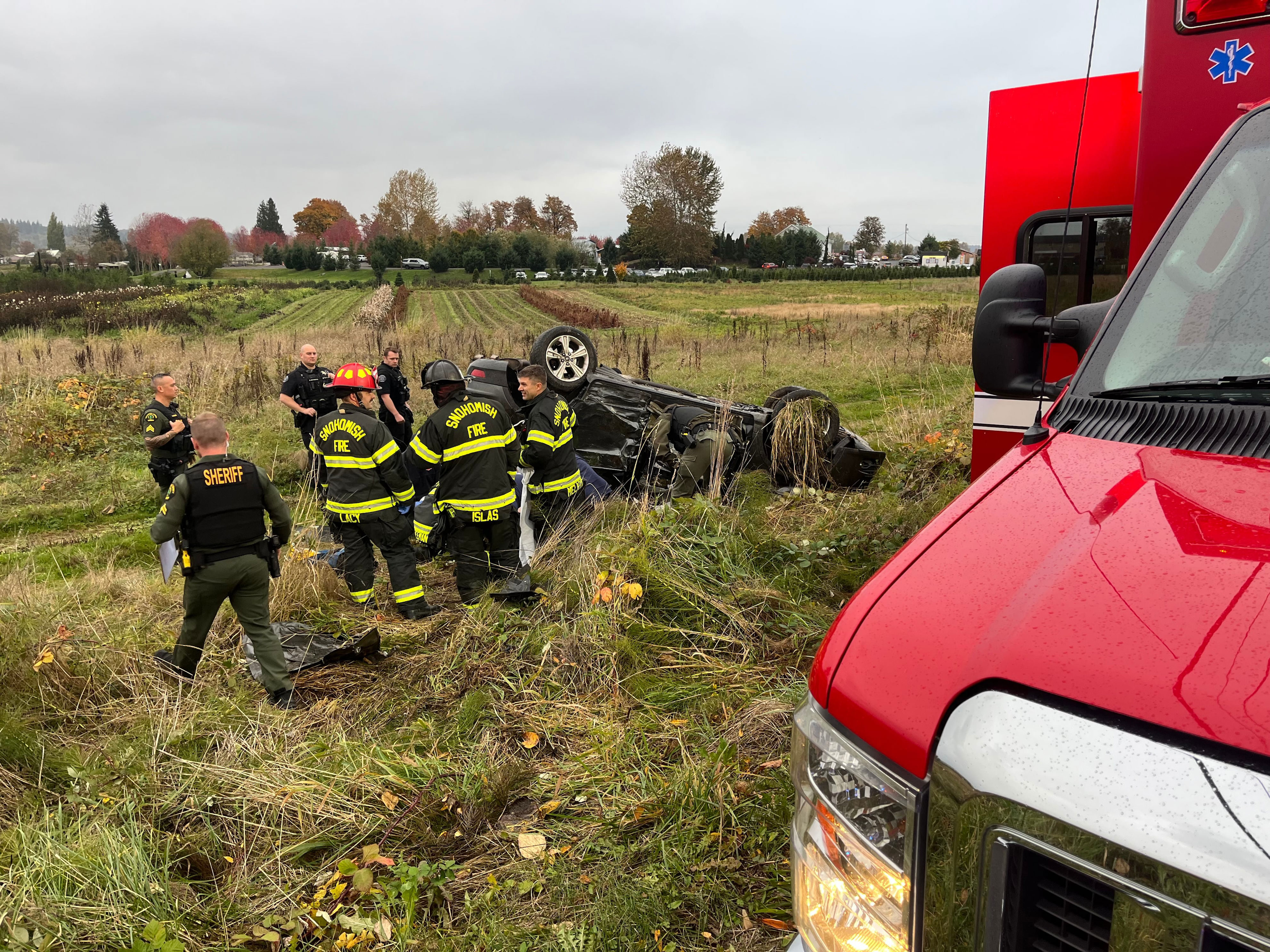 Two rescued from overturned car after power pole crash in Snohomish County