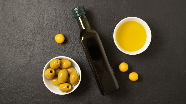 You Should Definitely Be Adding Olive Pits To Your Olive Oil Bottles ...