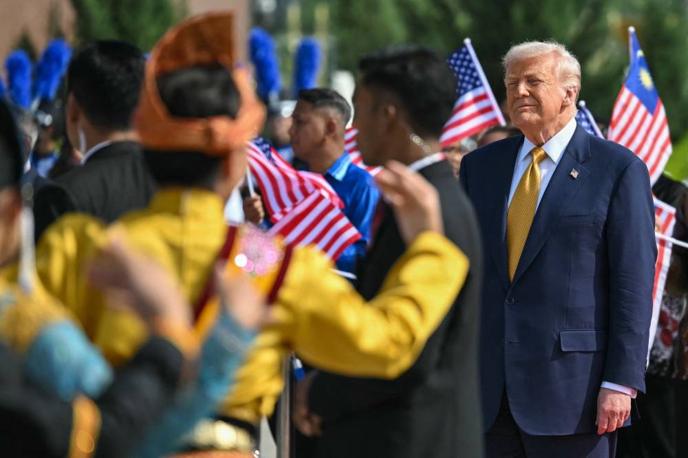 Anwar holds brief meeting with Trump before his departure for Tokyo