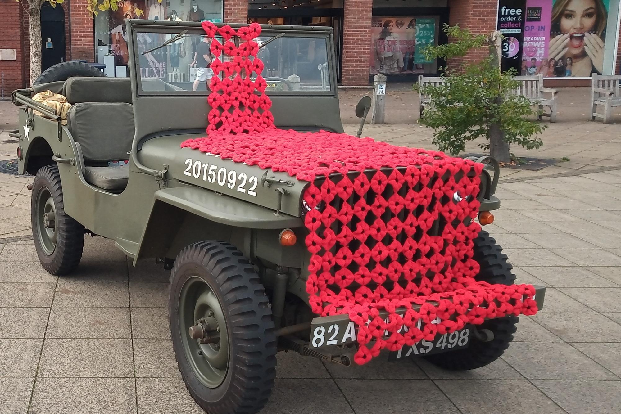 Over 100 Union flags in town and WWII jeep covered in hundreds of ...