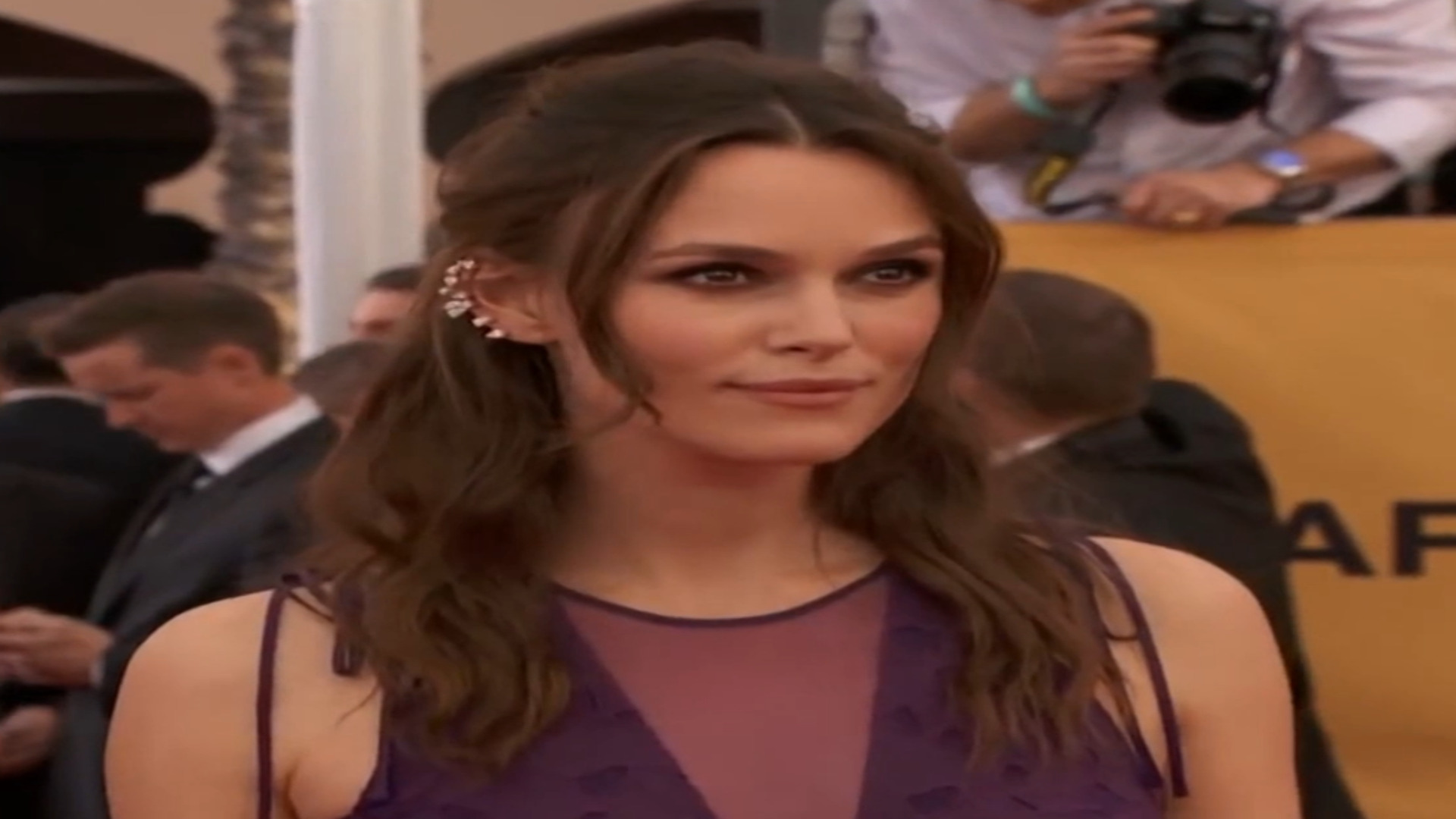 Keira Knightley stuns in a deep purple gown at the red carpet event