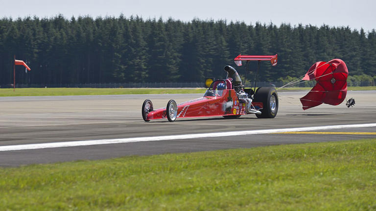 The role of parachutes in stopping drag cars