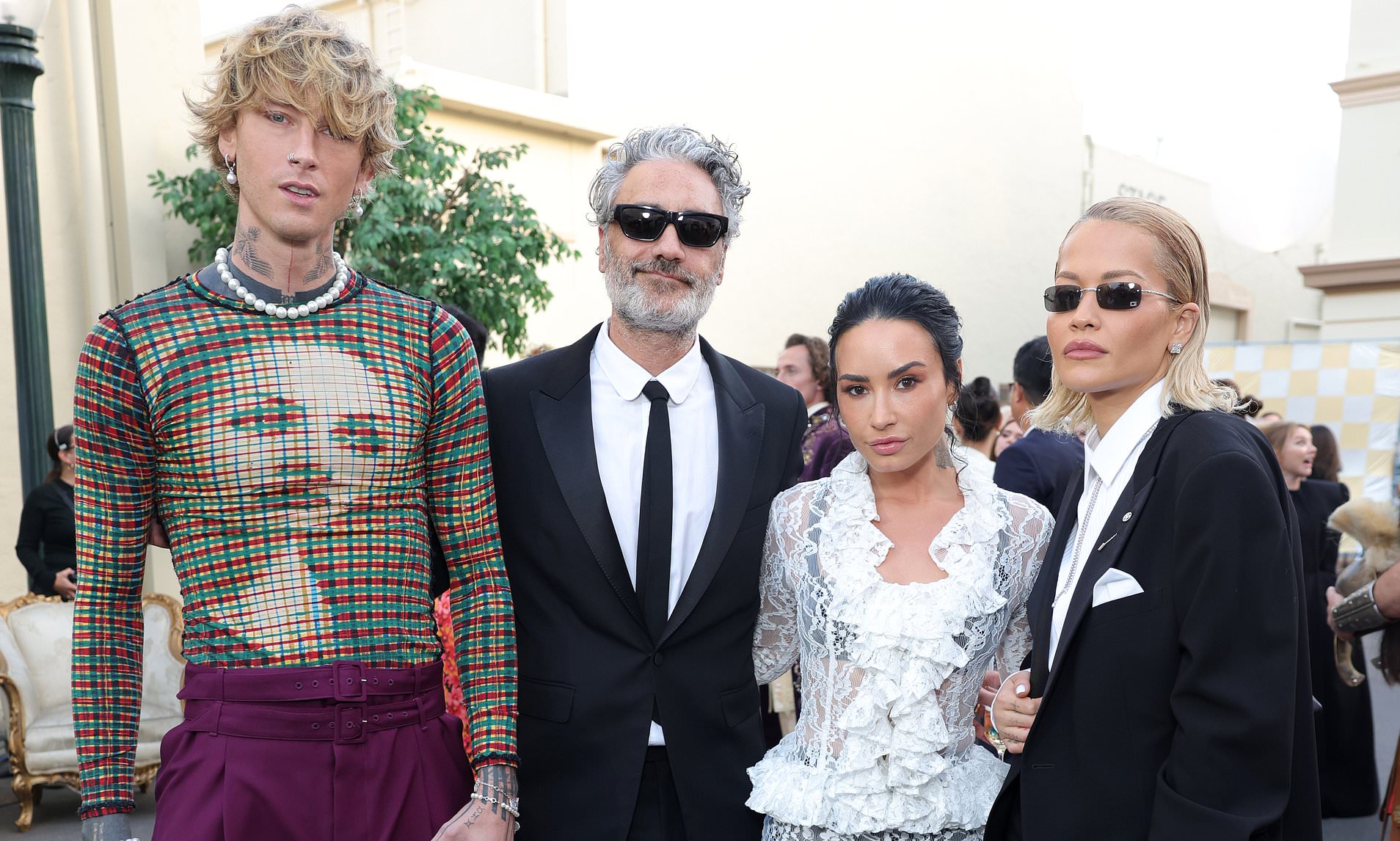 Machine Gun Kelly mingles with Camila Cabello and Demi Lovato