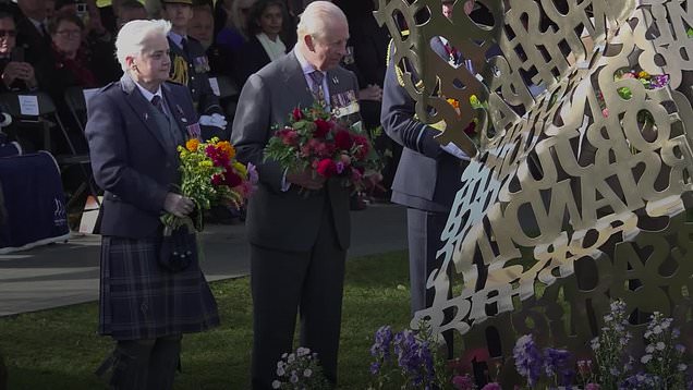 Charles lays flowers at first national LGBT armed forces memorial