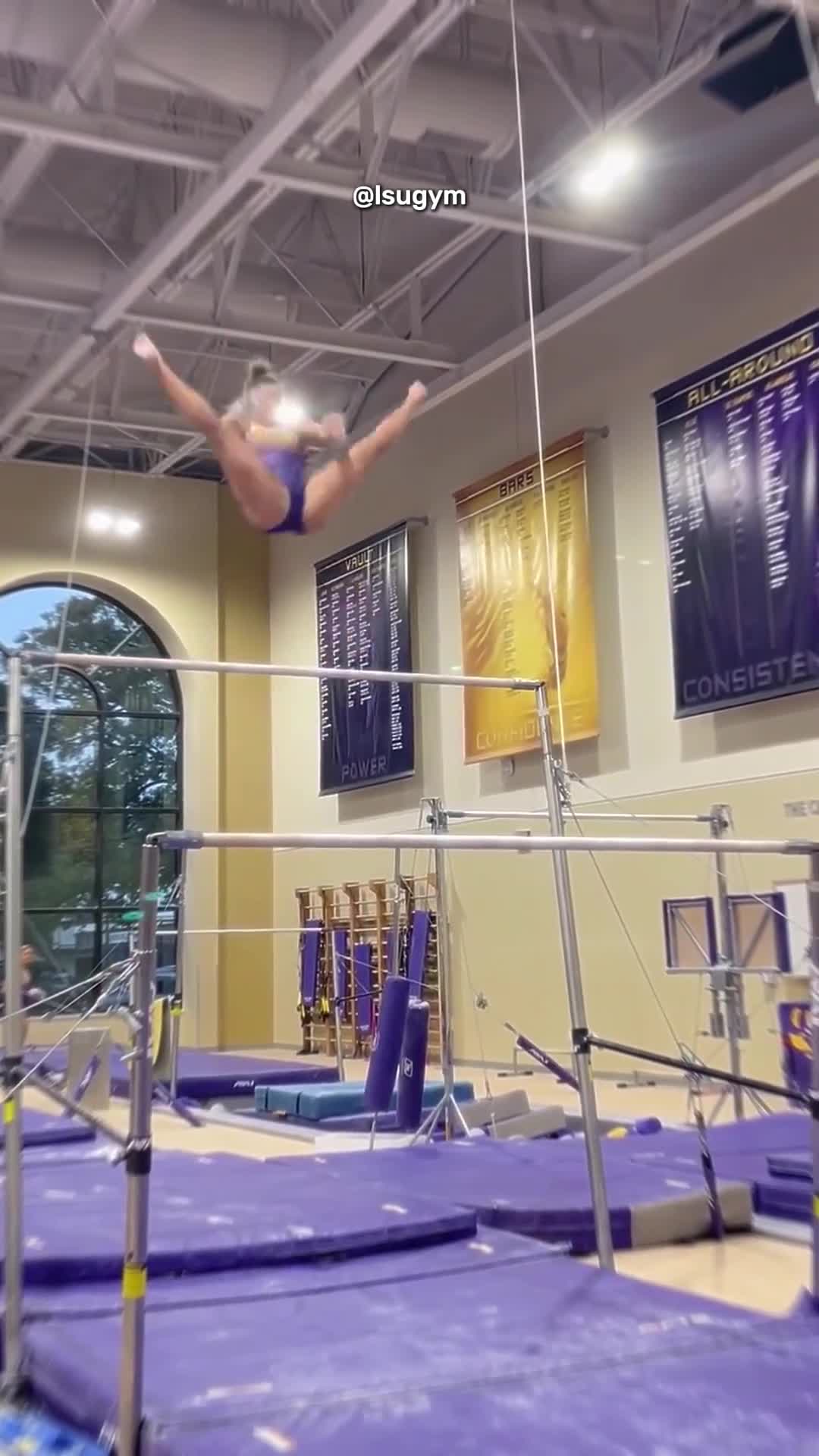Ashley Cowan on the bars