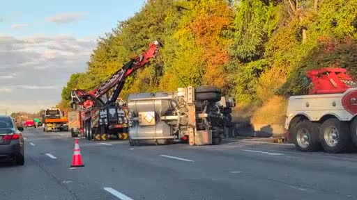Tractor-trailer overturns on I-695 Monday