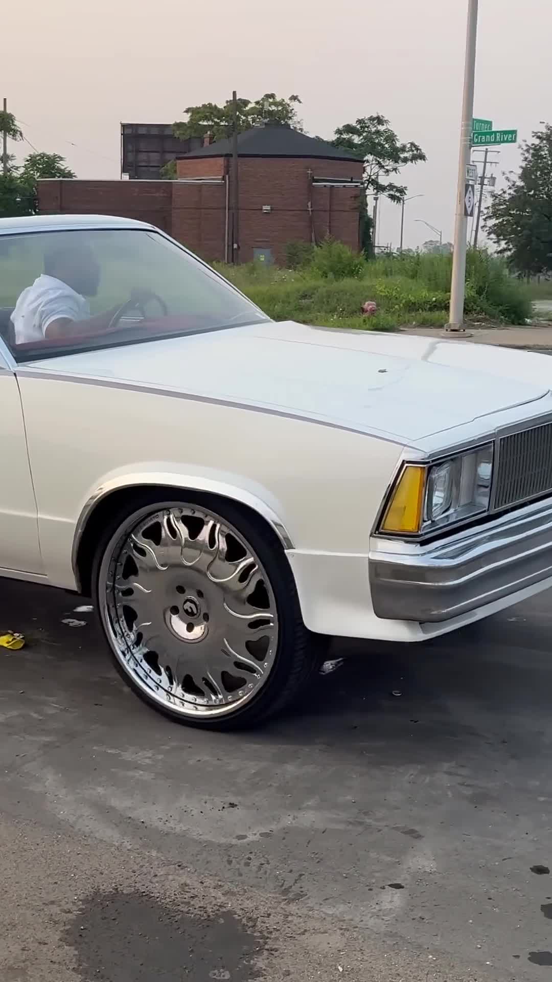 Drop-top Chevy Malibu on 24’s Forgiatos