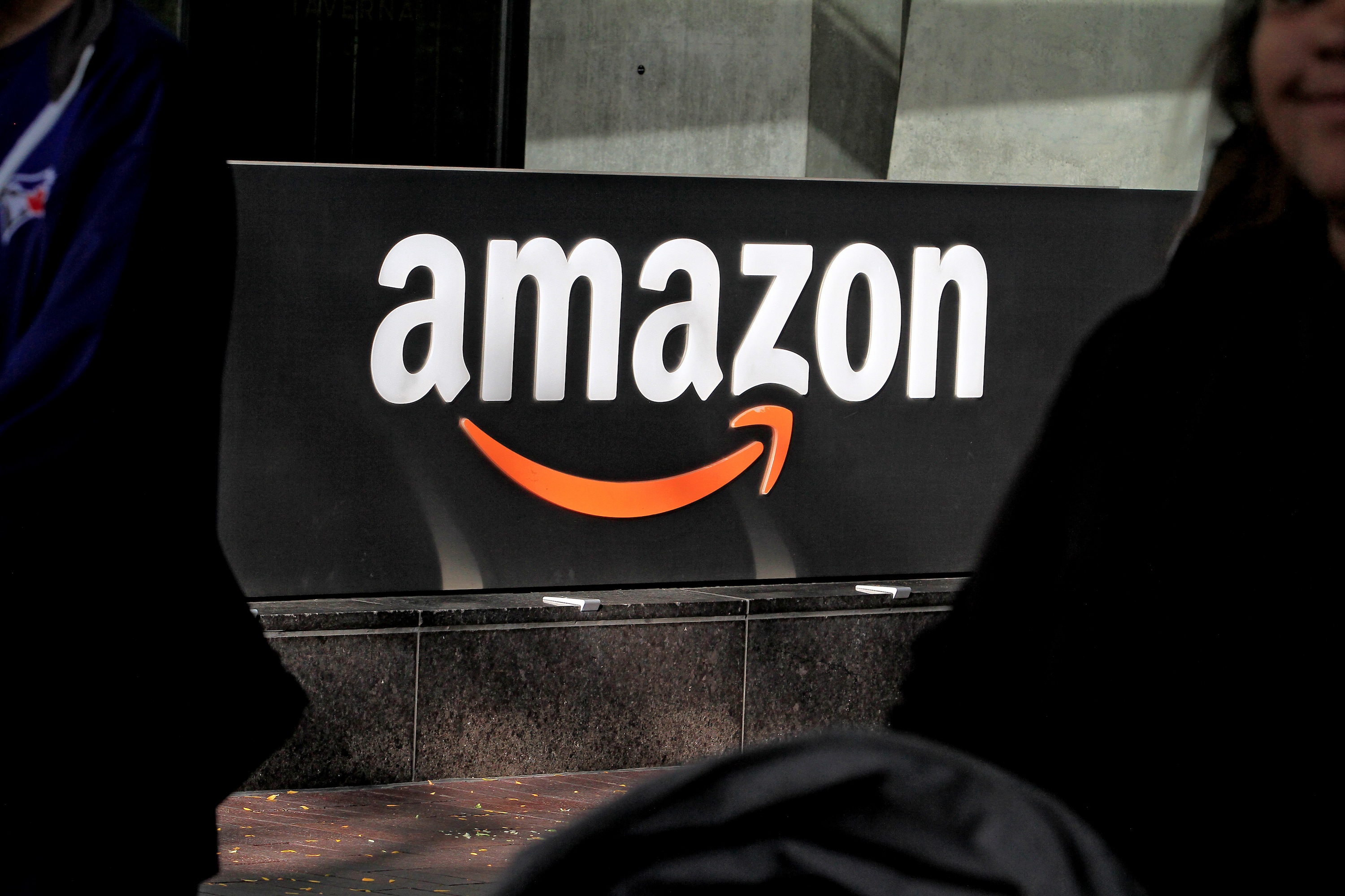 Amazon Cuts 14,000 Corporate Roles as AI, Cost Focus Reshape Workforce