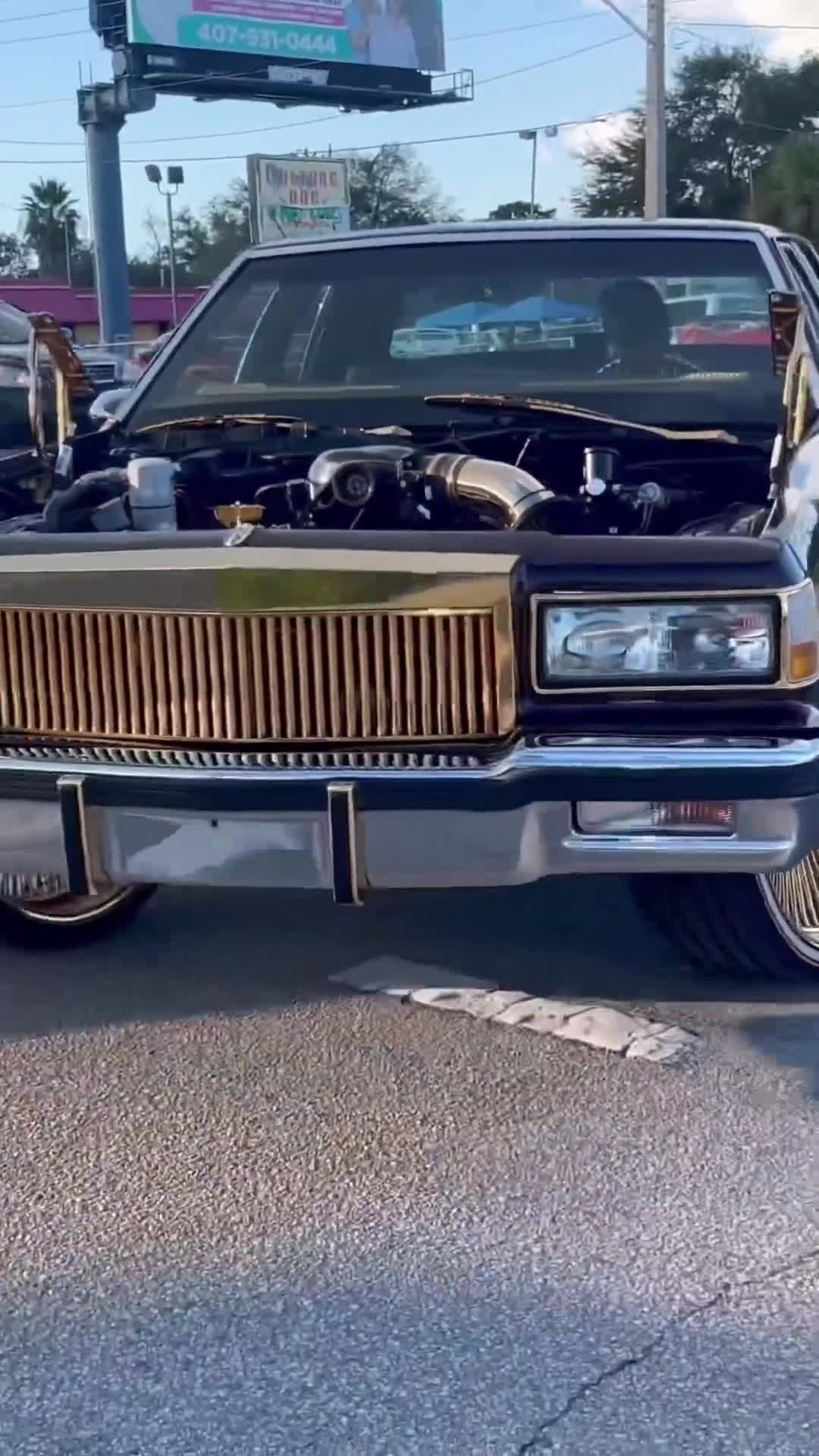 Brougham box Chevy on gold 24’s Daytons no hood edition