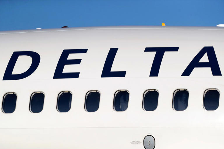 Delta flight attendant ‘inadvertently’ deploys emergency slide at ...