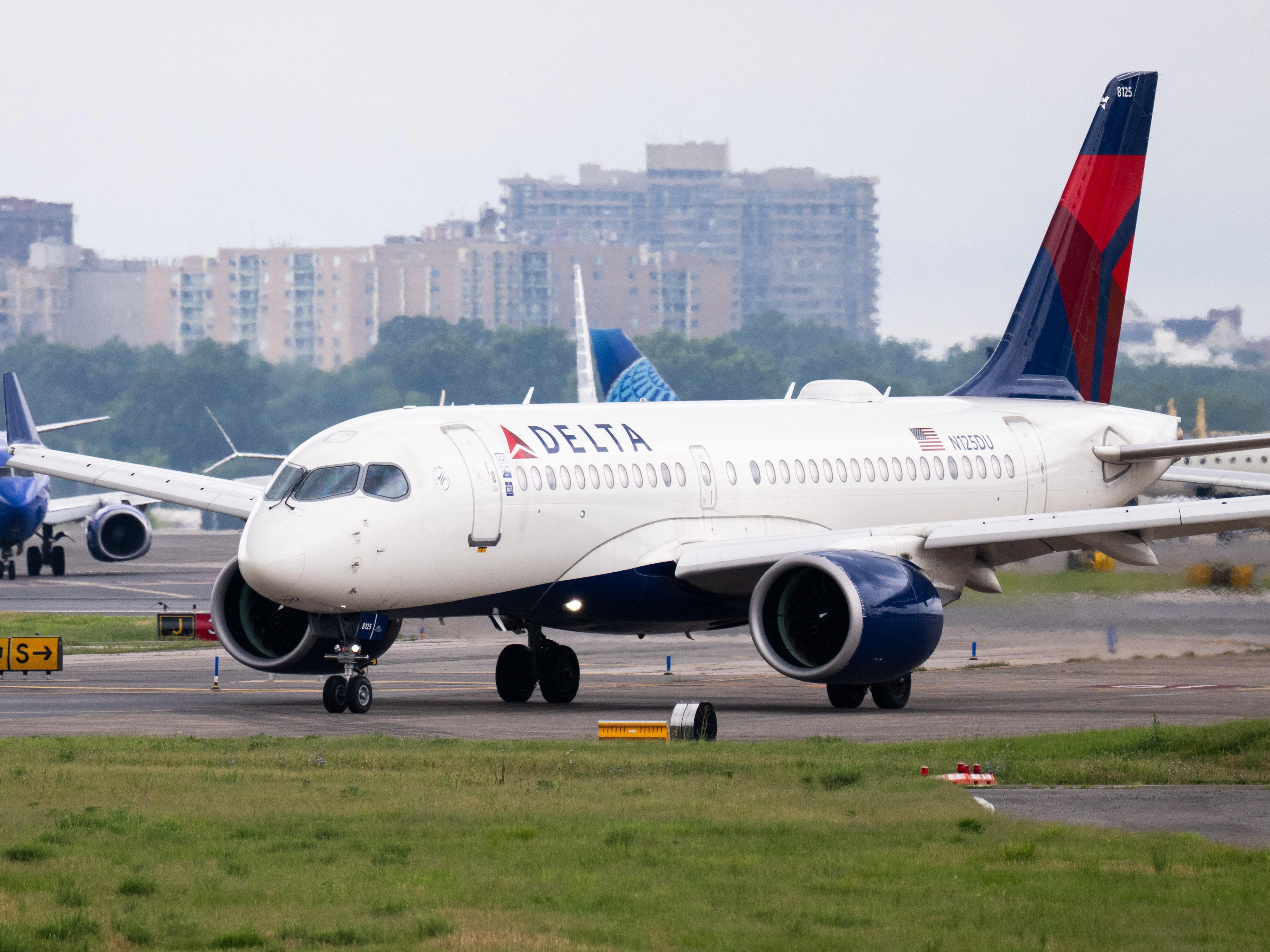 How a Delta crew member's emergency slide mistake could cost as much as ...
