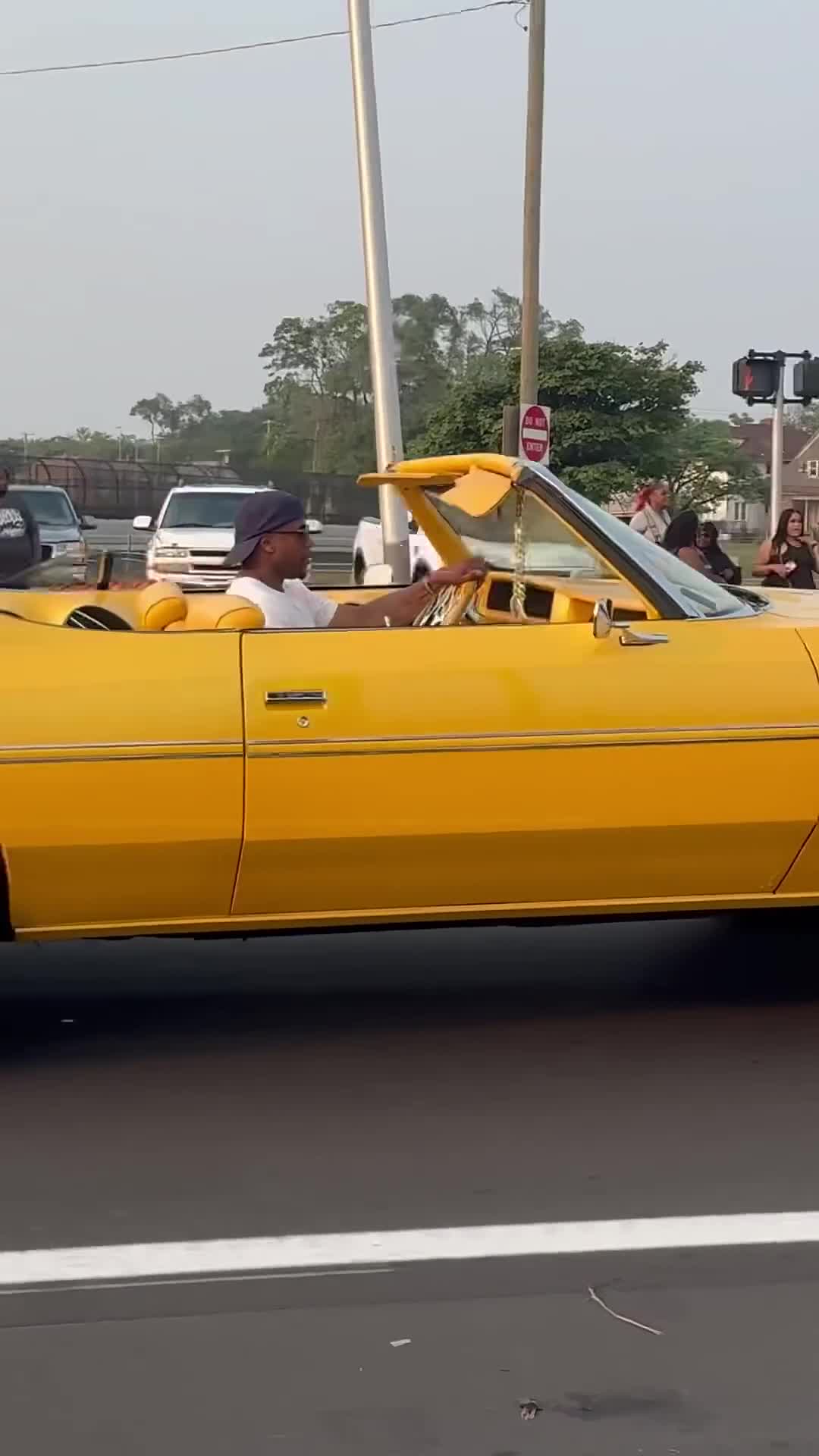 Yellow 75 Chevy Vert on 26’s riding
