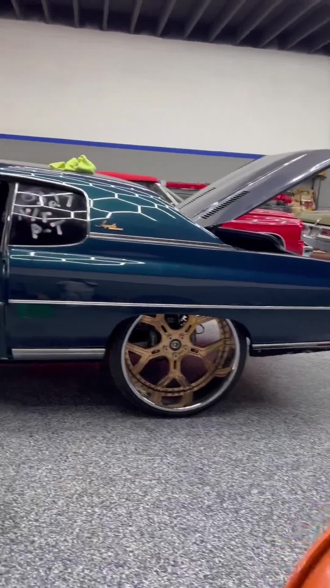 Blue Magic gettin' his race-car Chevy donk ready