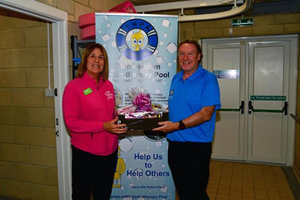 Hydrotherapy pool receives sweet donation from supermarket
