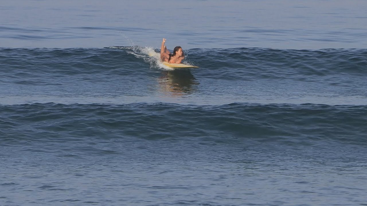 Exploring the glassy waves at Kuta Beach in Bali