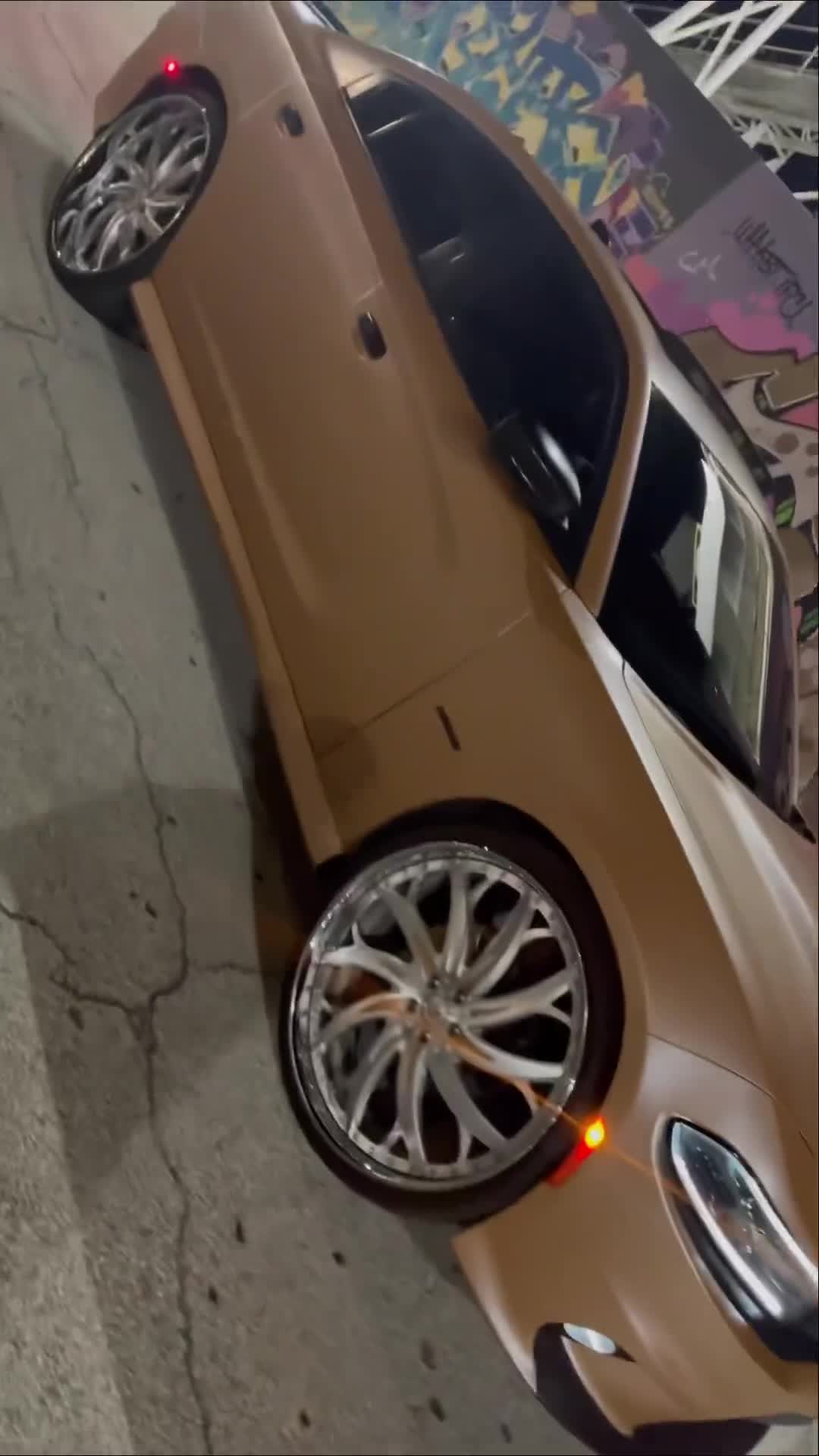 Caramel satin wrap charger on 26’s Forgiatos