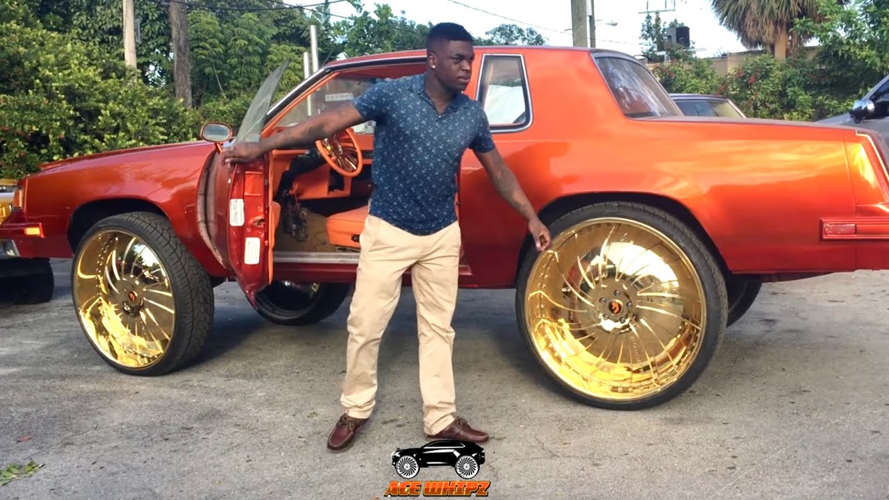 Kodak Black's Candy Tangerine Oldsmobile Cutlass on Gold 30"s Forgiatos ...