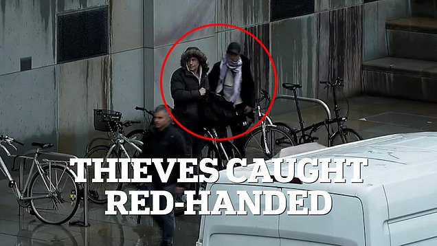 Shocking moment thieves are arrested outside a police station