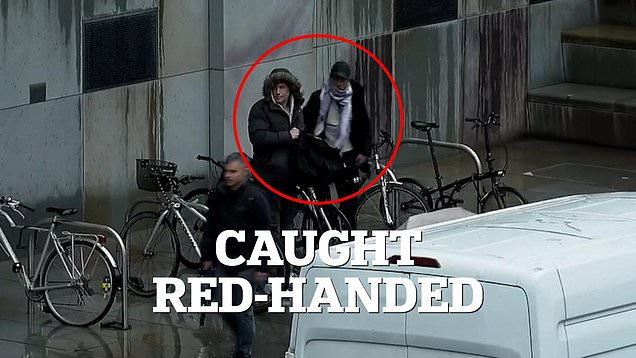 Shocking moment thieves are arrested outside a police station