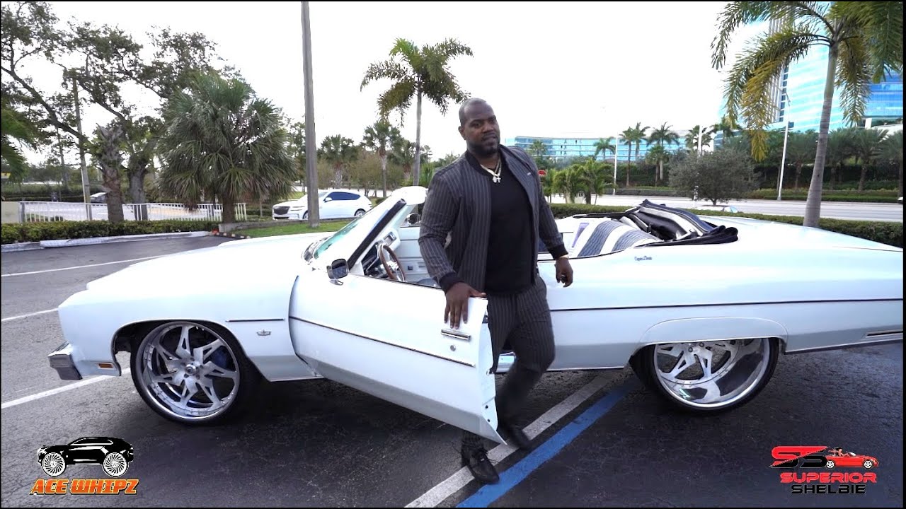 White 75 Chevy Caprice vert on 24x15" custom Asanti wheels