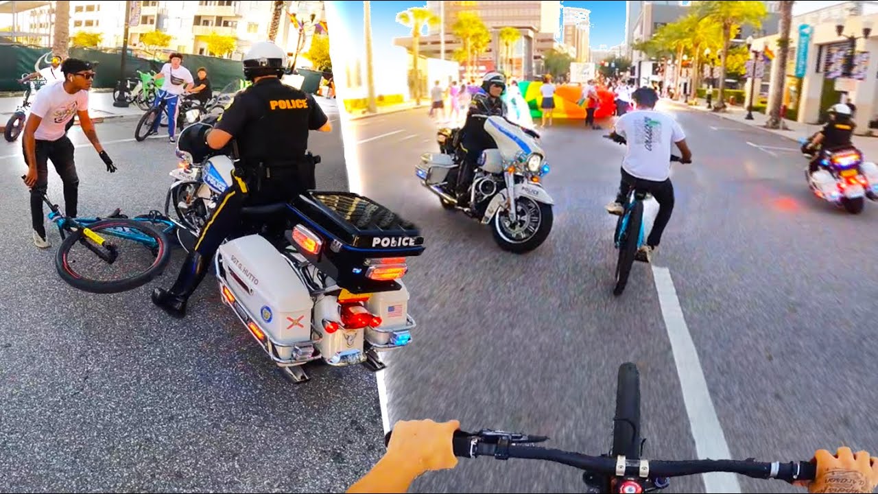 Angry police chase bikers down the street