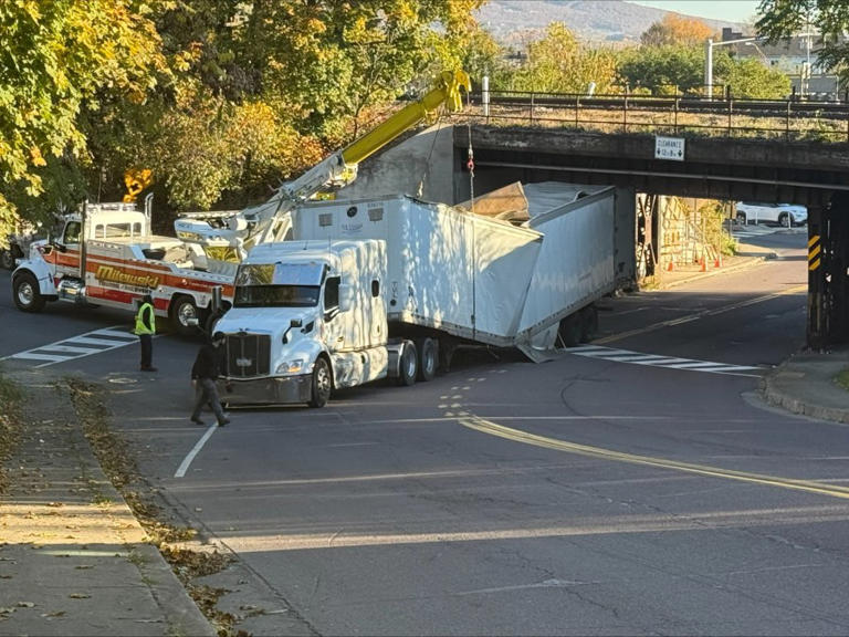 Truck stuck under bridge causing traffic delays in Scranton