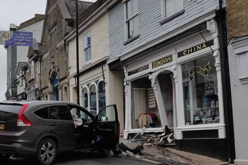 Car crashes into 150-year-old shop front